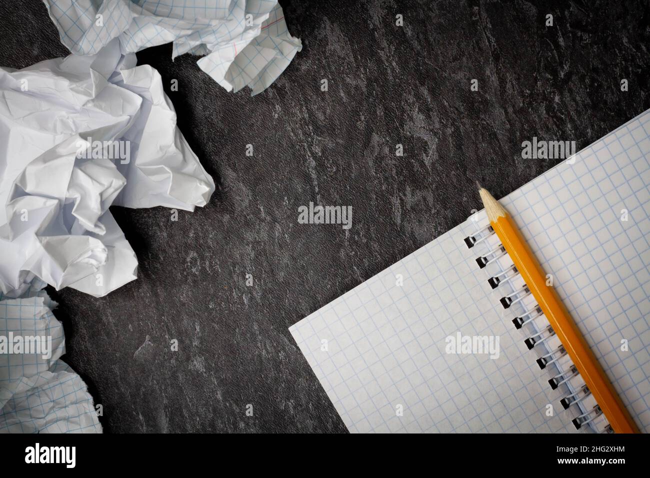 Crumpled and torn paper on the table. Torn piece of notebook. Paper ...