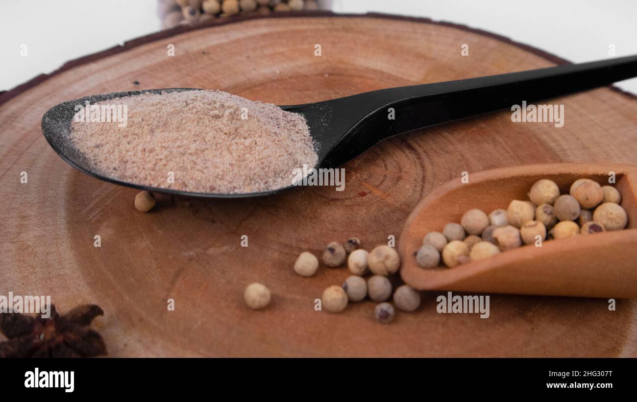 A Spoonful of White Pepper Powder Close Up Stock Photo - Alamy