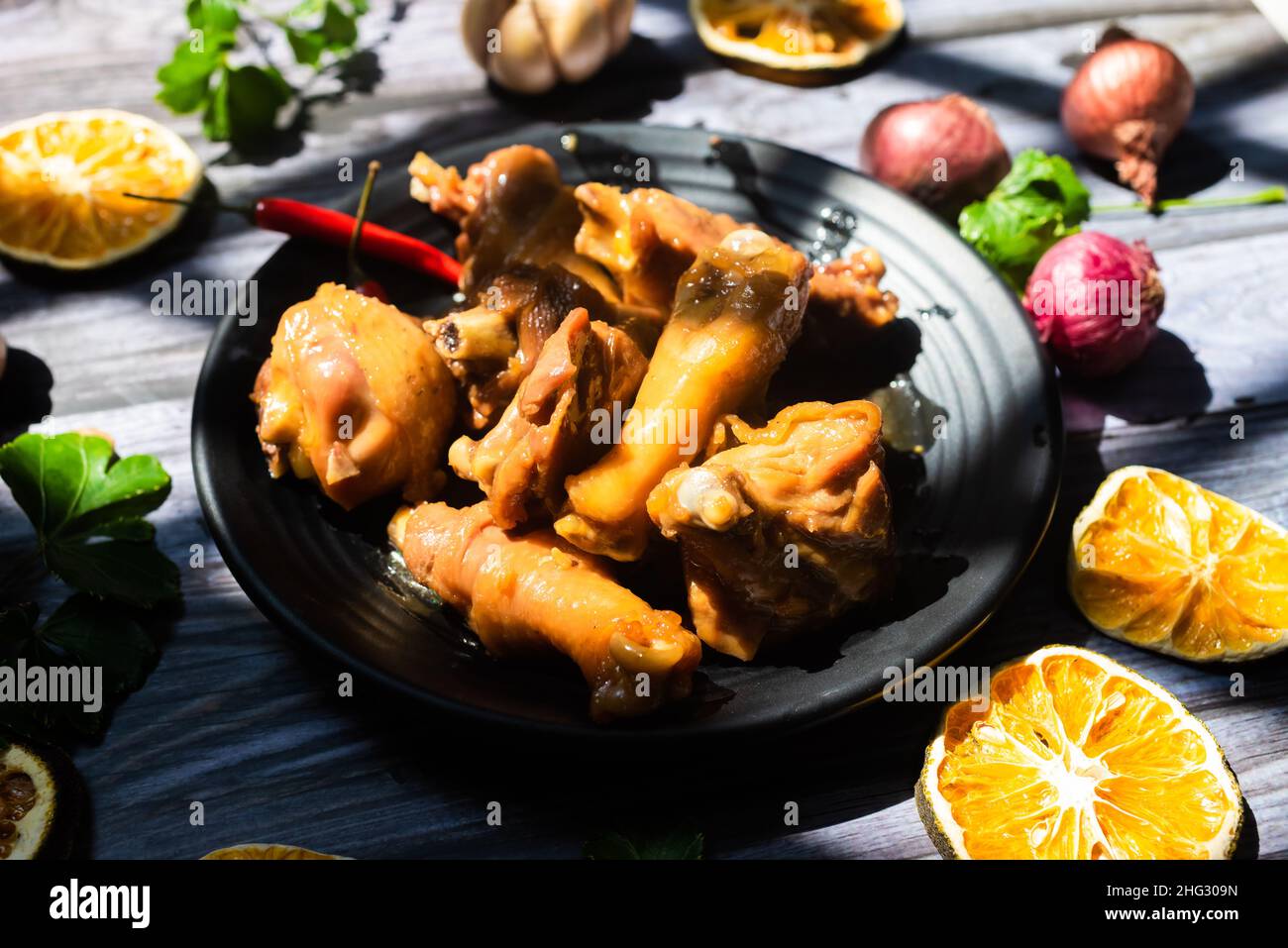 Braised chicken with fish sauce. ingredients including chicken, fish ...