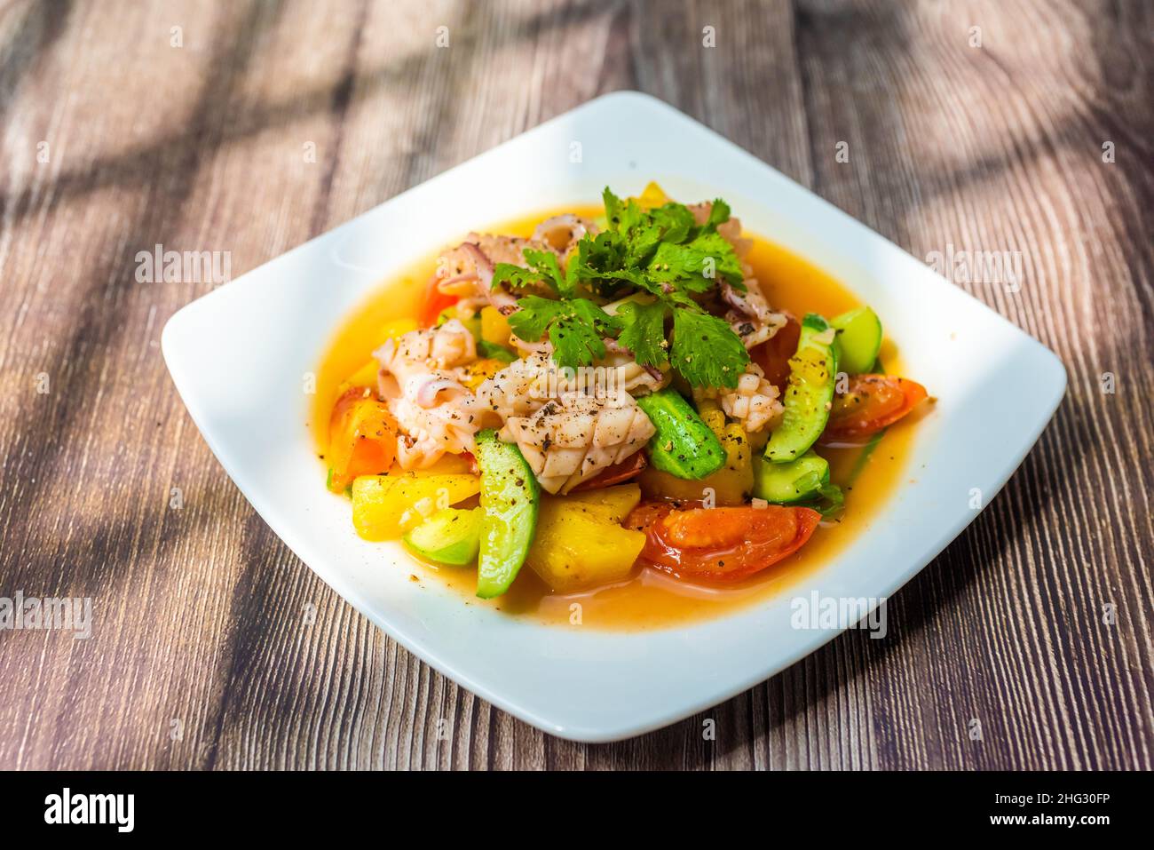 Crispy fried squid rolls. Ingredients include fresh squid and ruffles ...