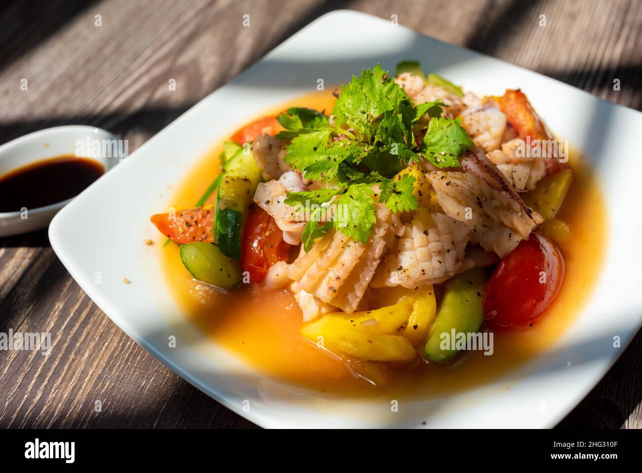 Crispy fried squid rolls. Ingredients include fresh squid and ruffles ...