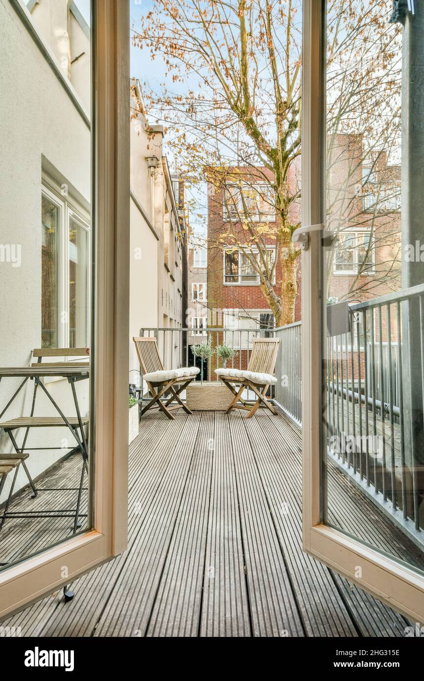 Balcony of a beautiful house in the daytime Stock Photo - Alamy