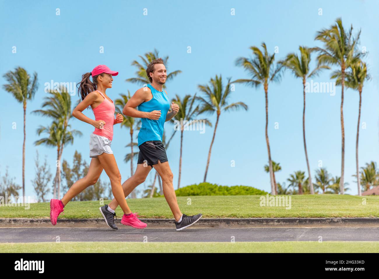 Sport fitness runners couple running lifestyle. Healthy people jogging ...