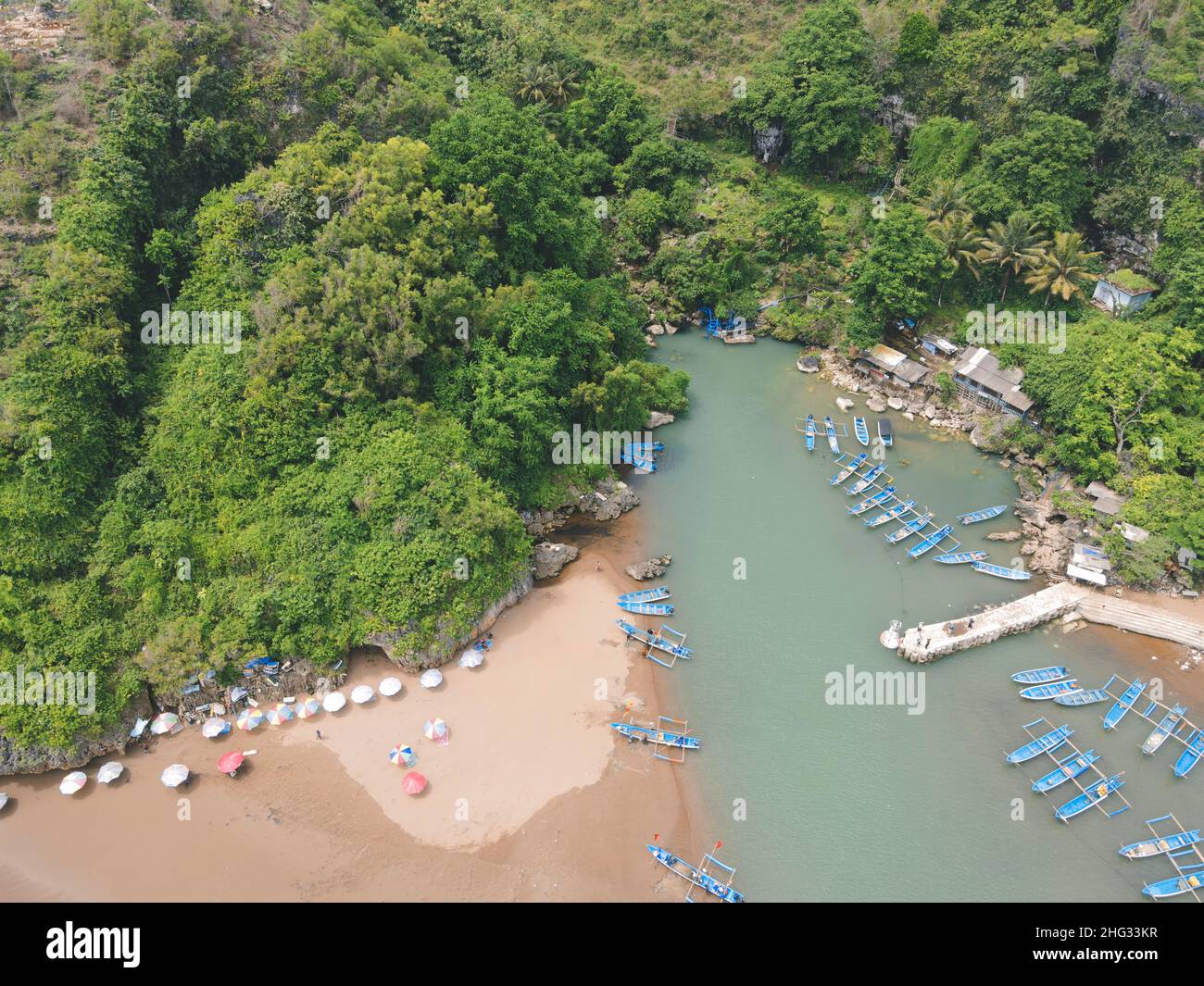 Aerial view of Baron beach in Yogyakarta, Indonesia with lighthouse and ...