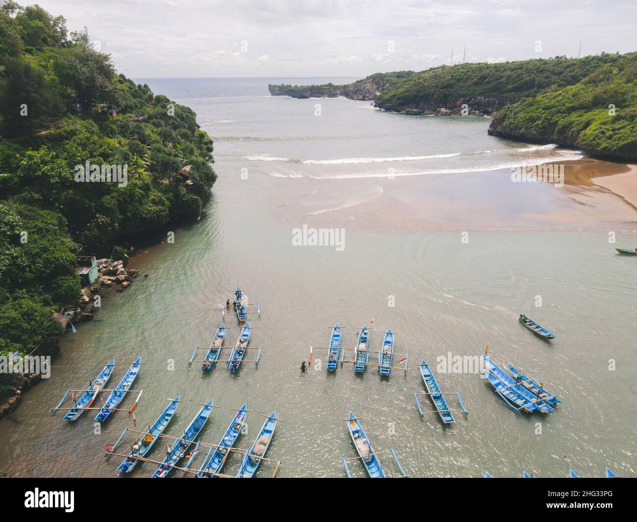 Aerial view of Baron beach in Yogyakarta, Indonesia with lighthouse and ...