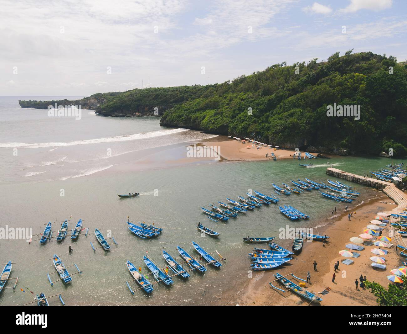 Aerial view of Baron beach in Yogyakarta, Indonesia with lighthouse and ...