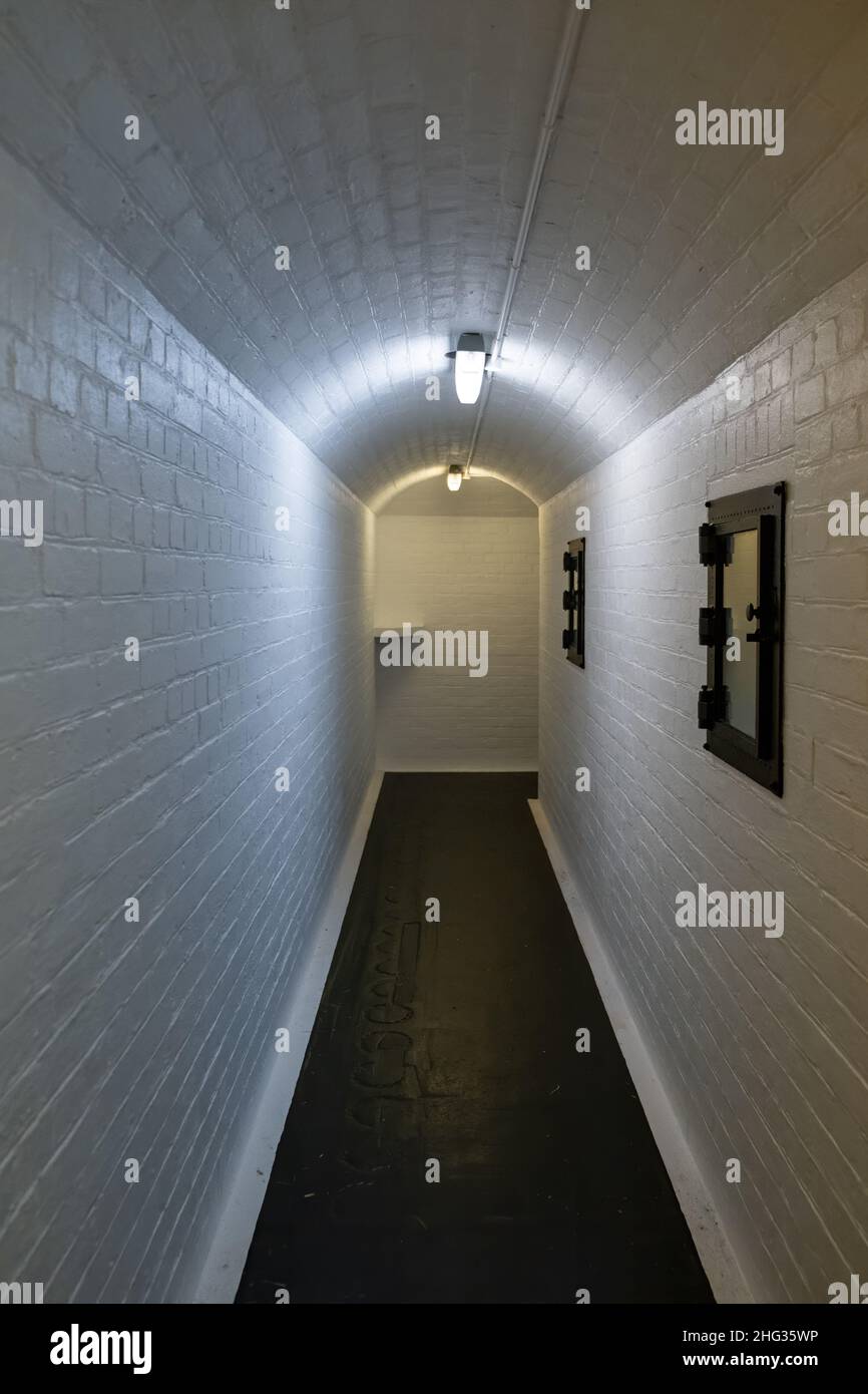 Narrow corridor with white bricks in old historic fortification Stock ...