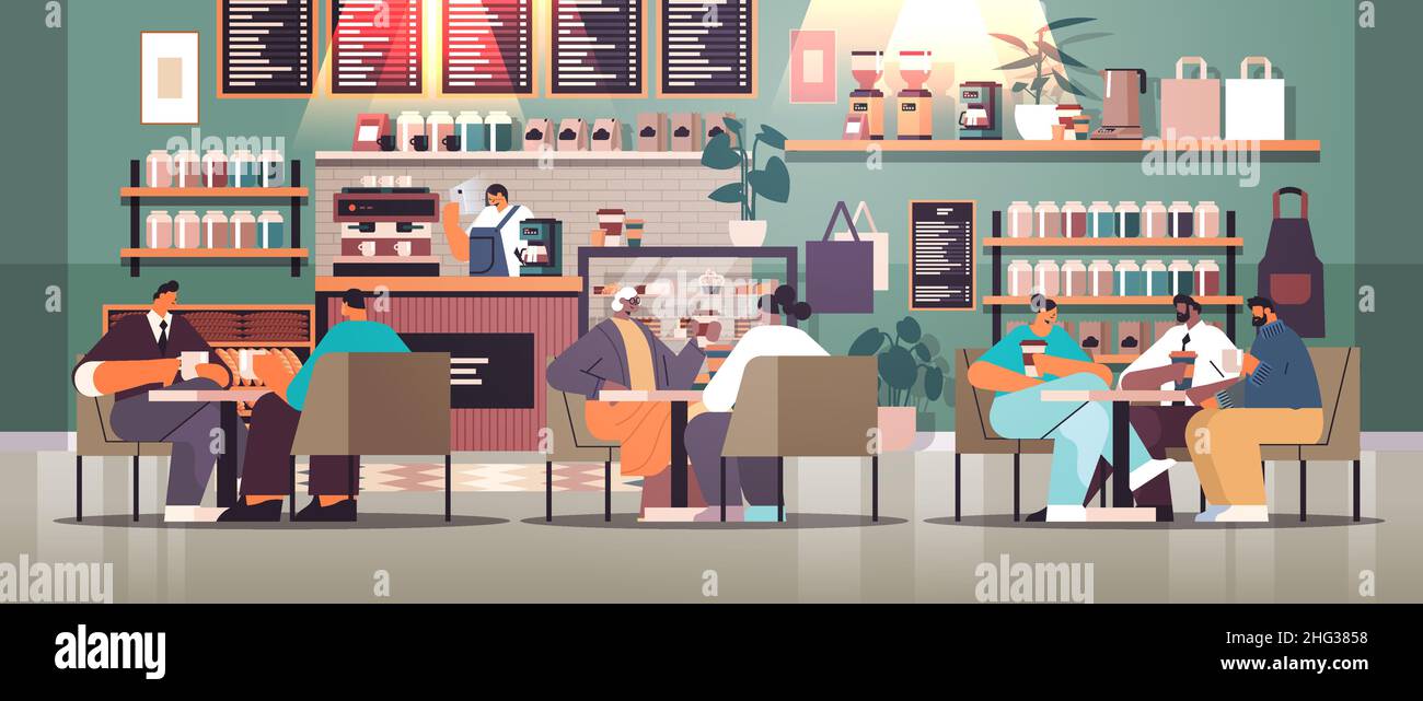 mix race businesspeople sitting at cafe table and drinking coffee ...