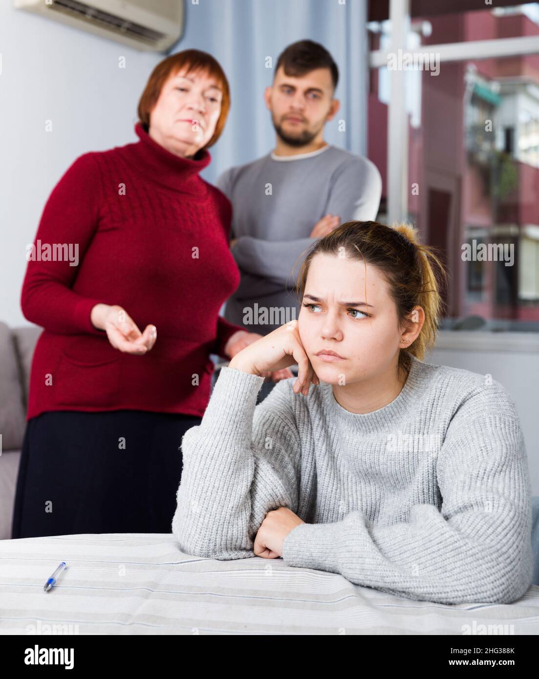 Frustrated girl having problems in relationship with family Stock Photo ...