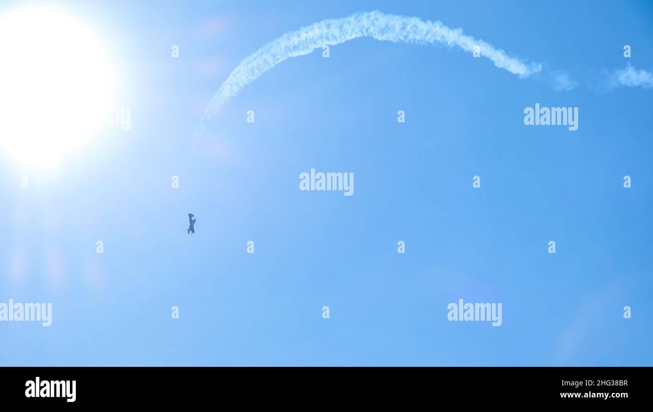 Overhead flying aircraft. Aircraft in formation during an aerobatics ...