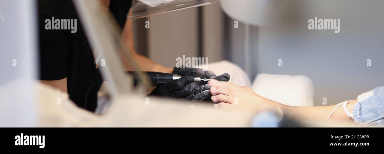 Lady cleaning persons feet Stock Photo - Alamy