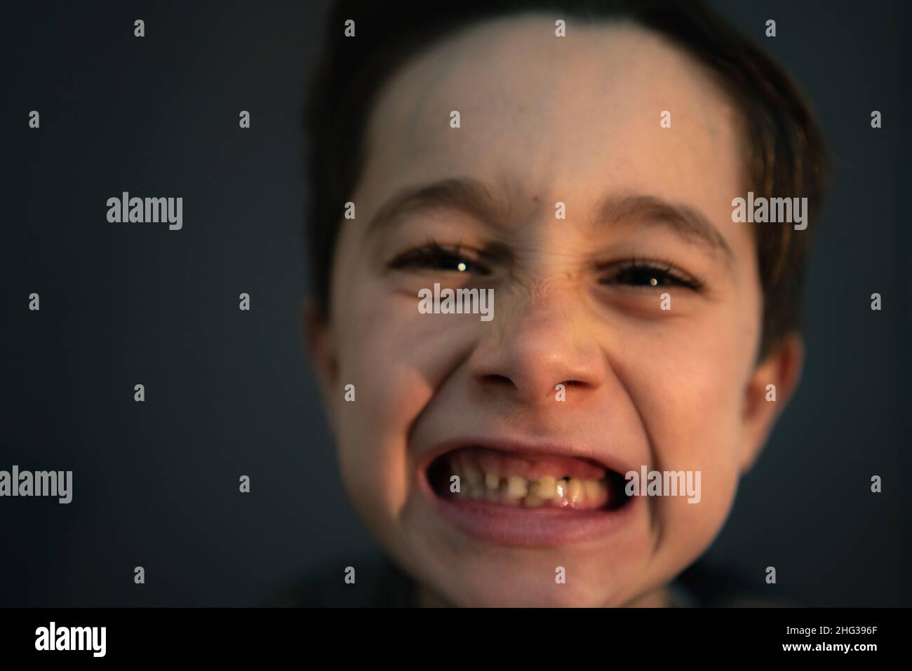 Close up photo of boy crying Stock Photo - Alamy