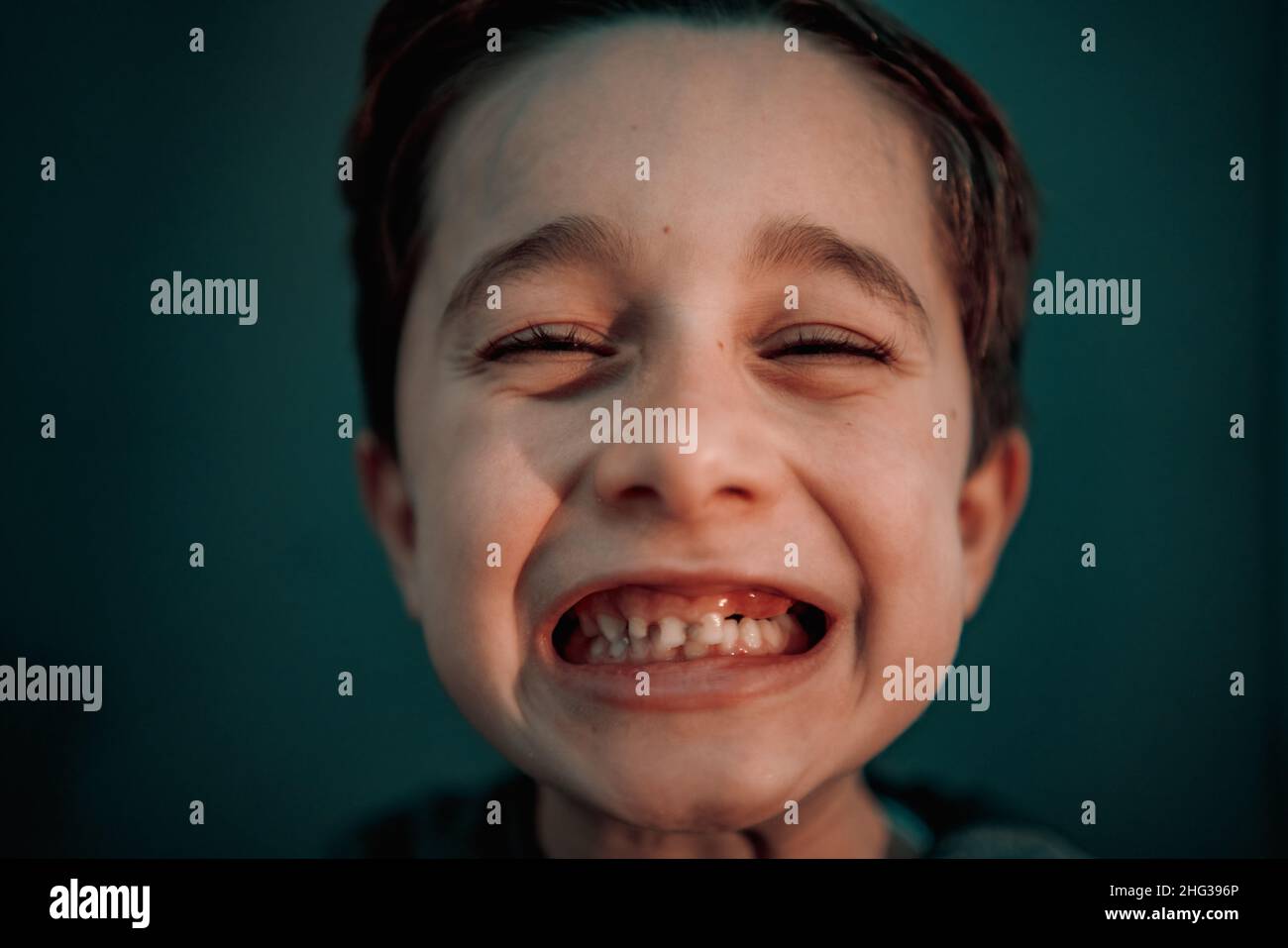 Close up photo of boy crying Stock Photo - Alamy