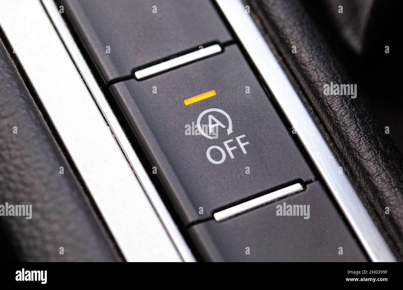Button to turn off the start-stop system in a modern car Stock Photo ...