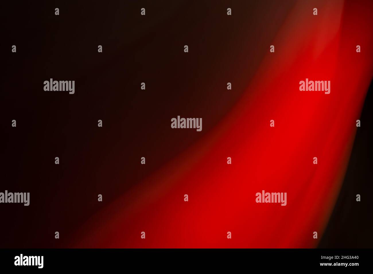 Abstract red light on a black background. Backdrop Stock Photo - Alamy