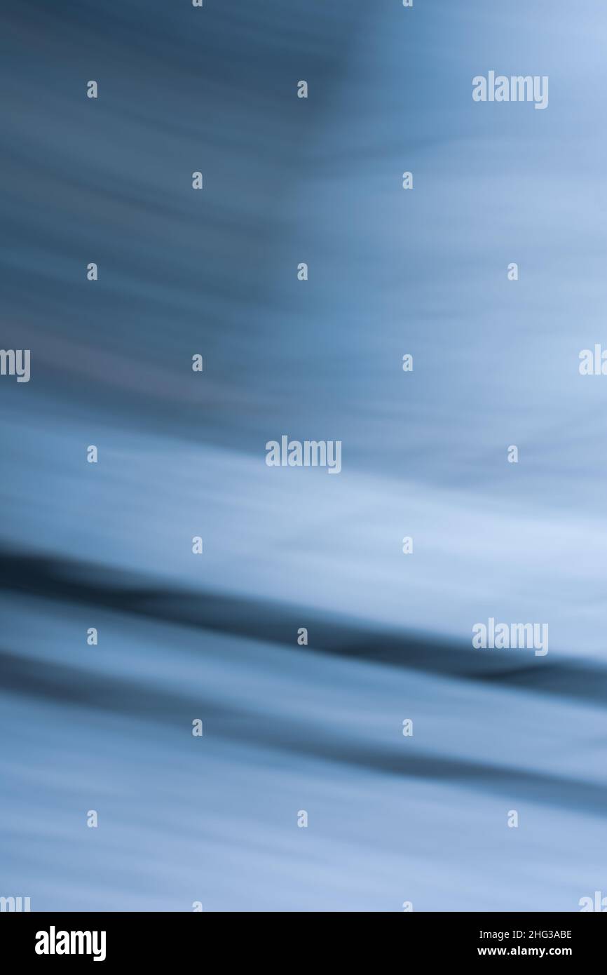 Vertical blue abstract background banner with stripes waves and ...