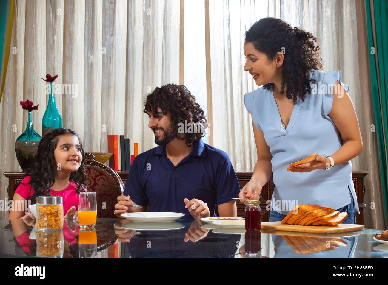 Man buttering bread hi-res stock photography and images - Alamy