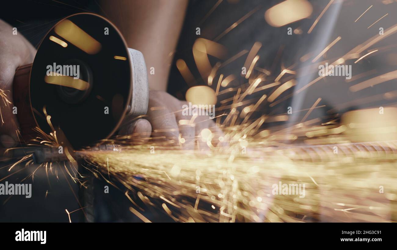 Mechanic using grinding machine on hi-res stock photography and images ...