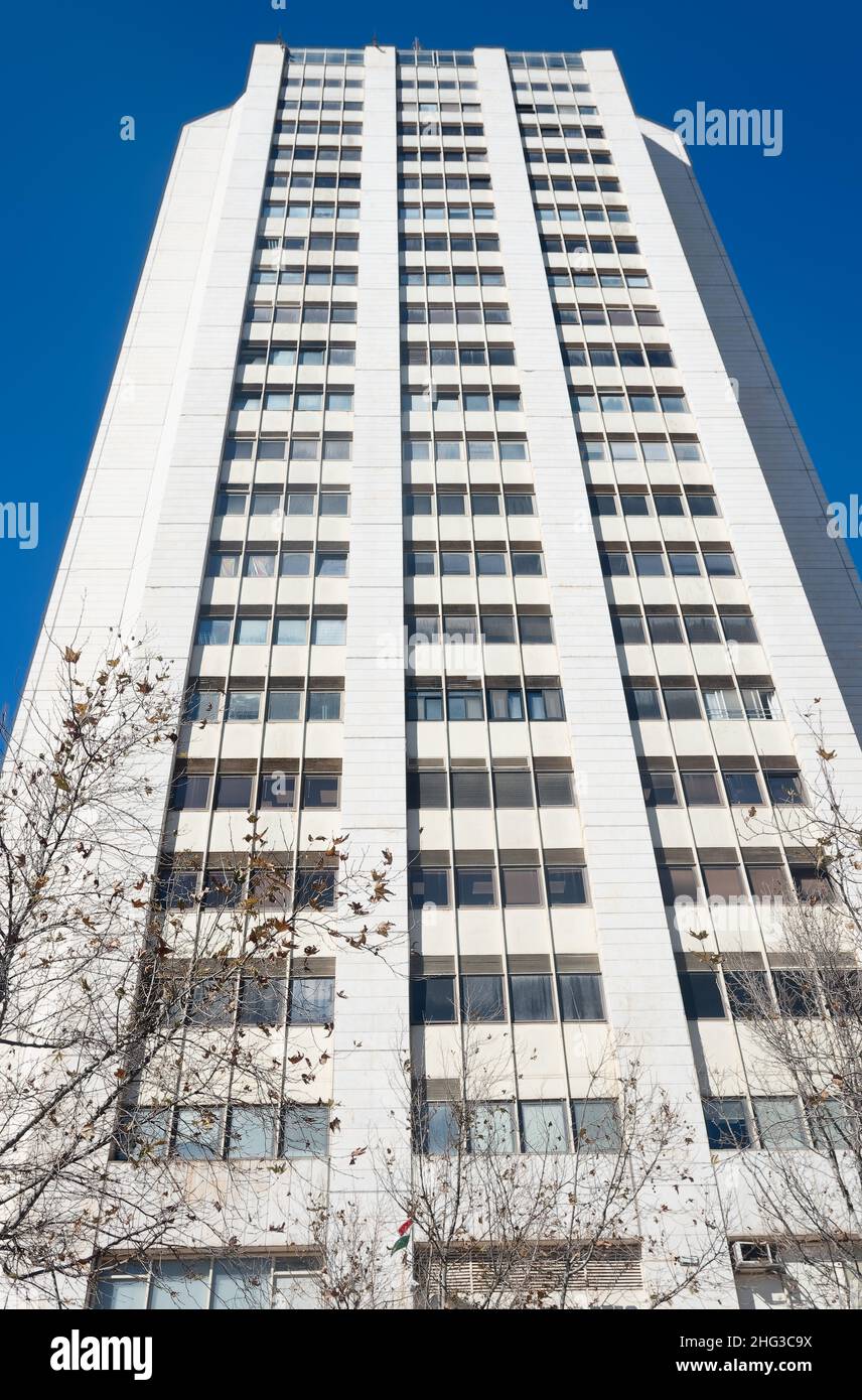 Modern building at business center city. Look up view with sunlight ...
