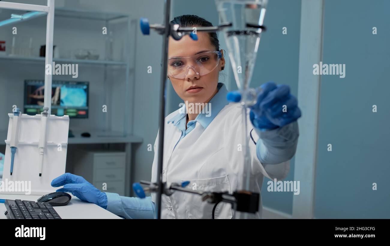 Chemical liquid dripping doctor scientist hi-res stock photography and ...