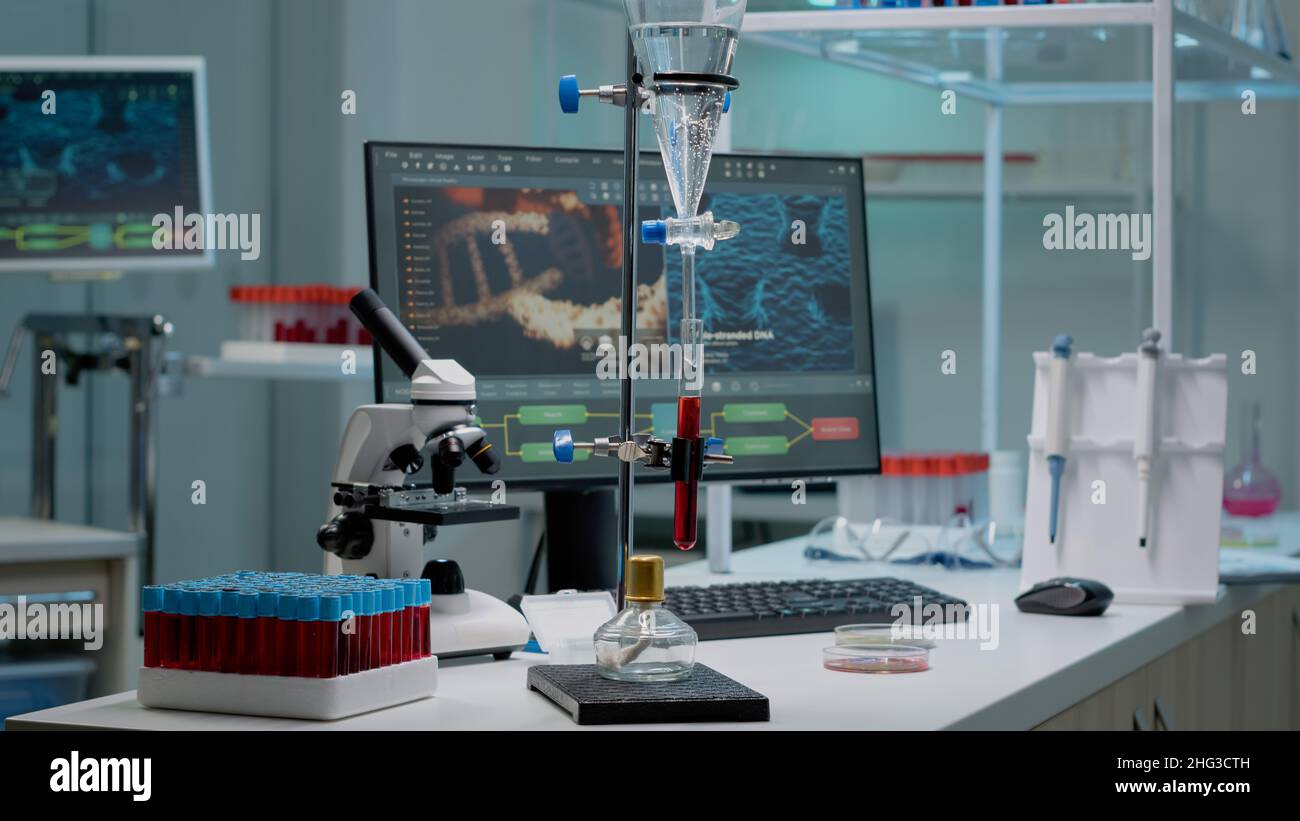 Chemical experiment with test tube in laboratory used for scientific ...