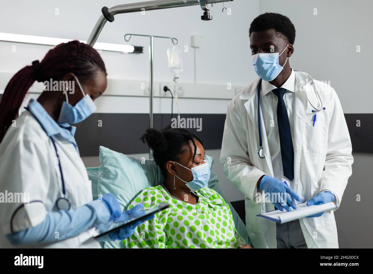 Medical team with face masks to prevent infection with coronavirus ...