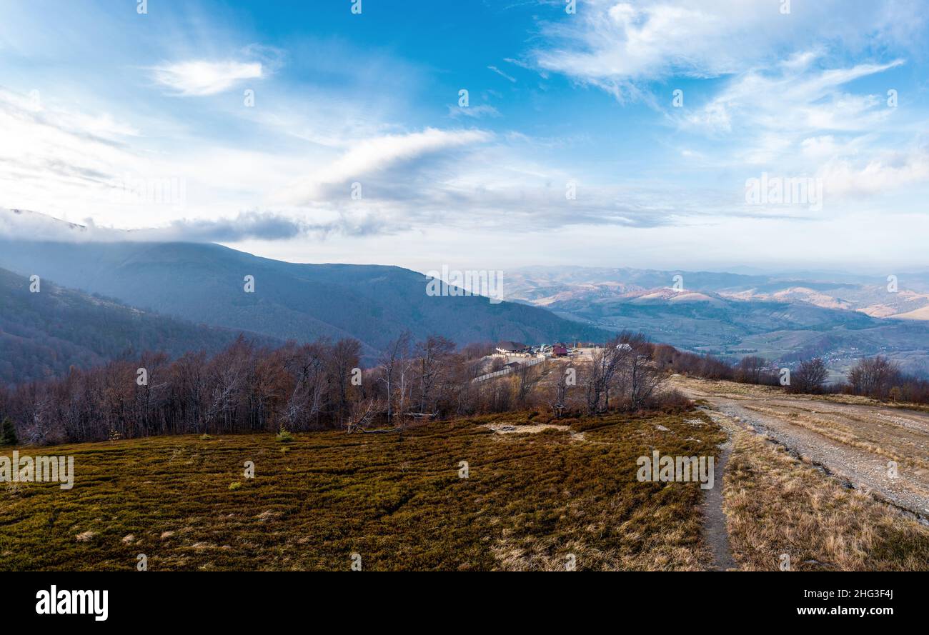 Long narrow pathways running along high mountain ridge under white ...