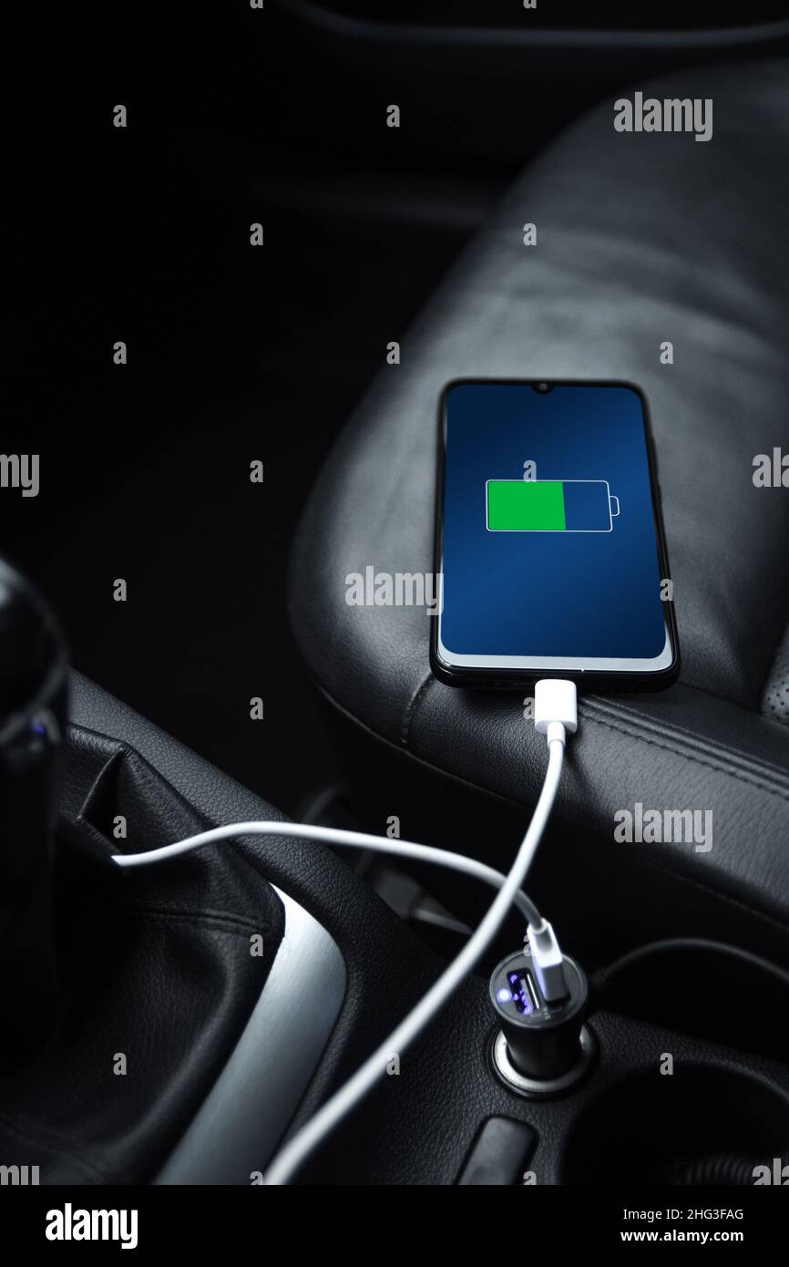 Mobile phone ,smartphone, cellphone is charged ,charge battery with usb ...