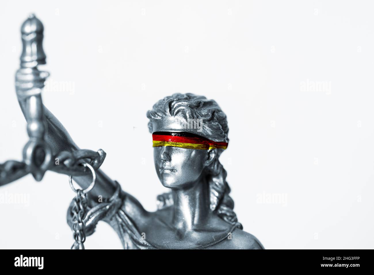 Statue of Justice and flag of Germany Stock Photo - Alamy