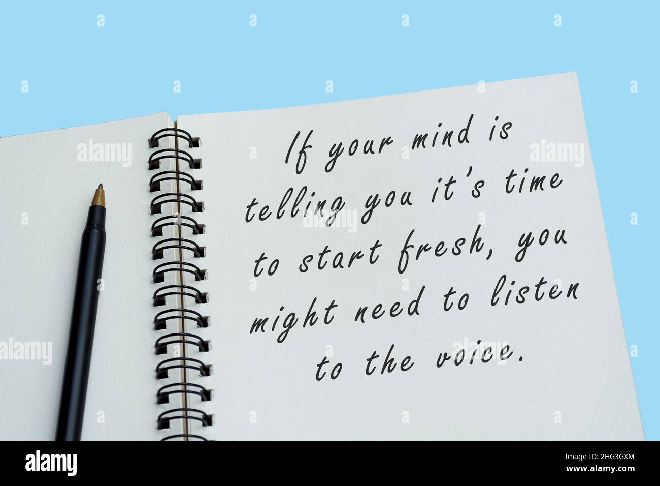 Top view of white notebook with motivational quote Stock Photo - Alamy