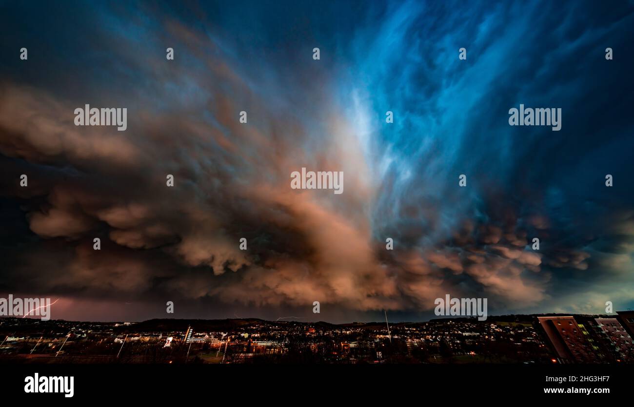 Udder clouds on an epic dramatic stormy sky with flashes of lightning ...