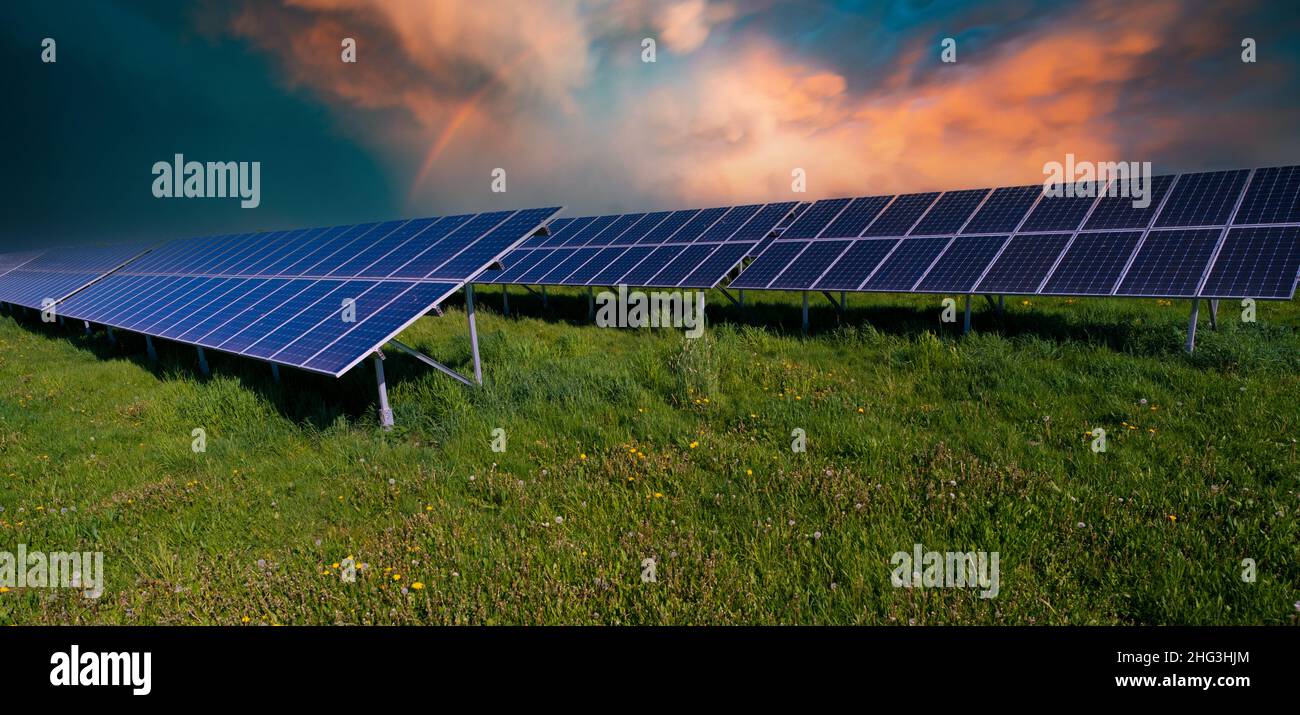 Solar cells park on the background of the sunset sky Stock Photo - Alamy