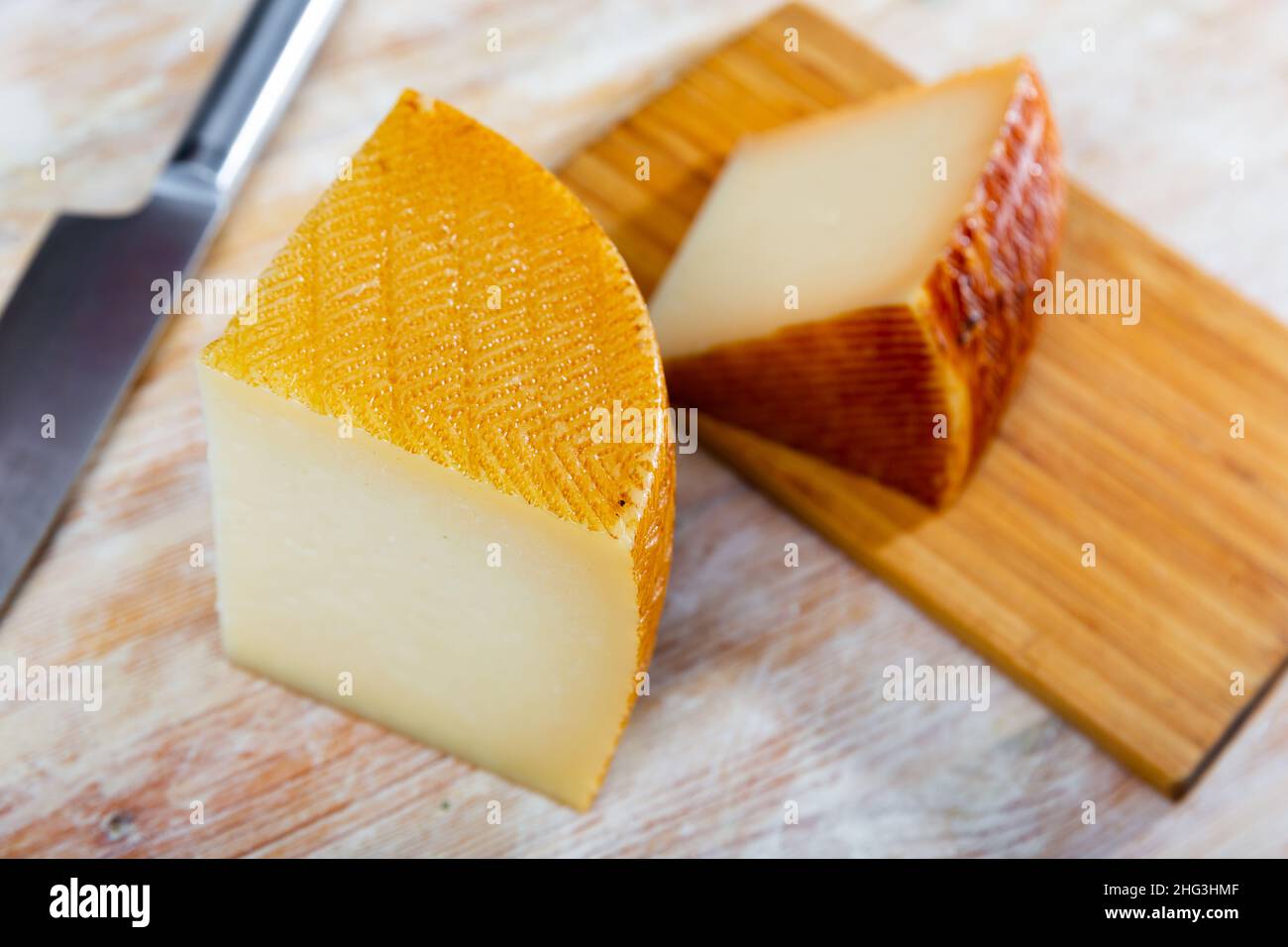 Traditional Spanish cheese - with ivory color and small irregular holes ...