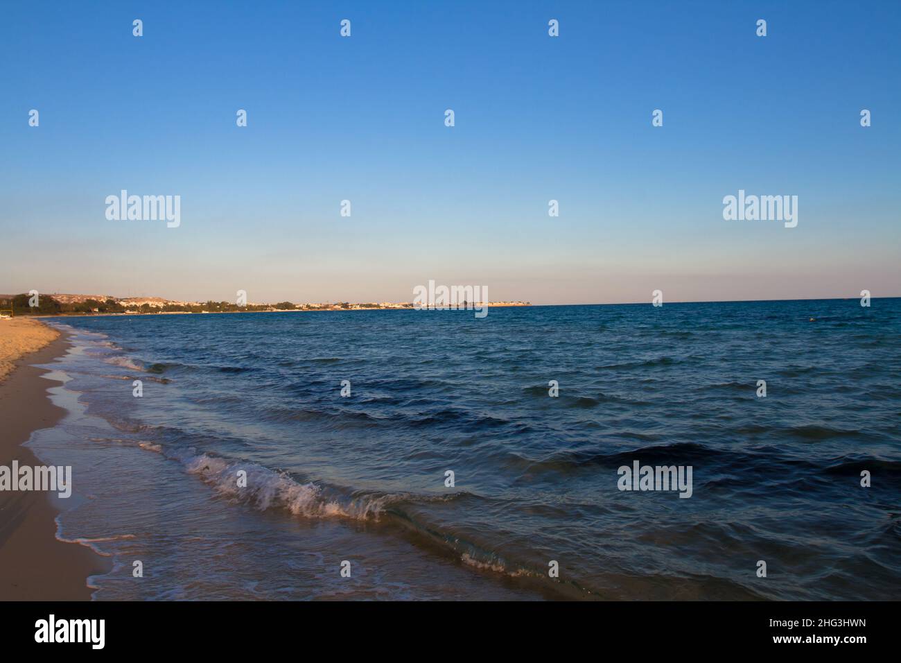 wave on a beach Stock Photo - Alamy