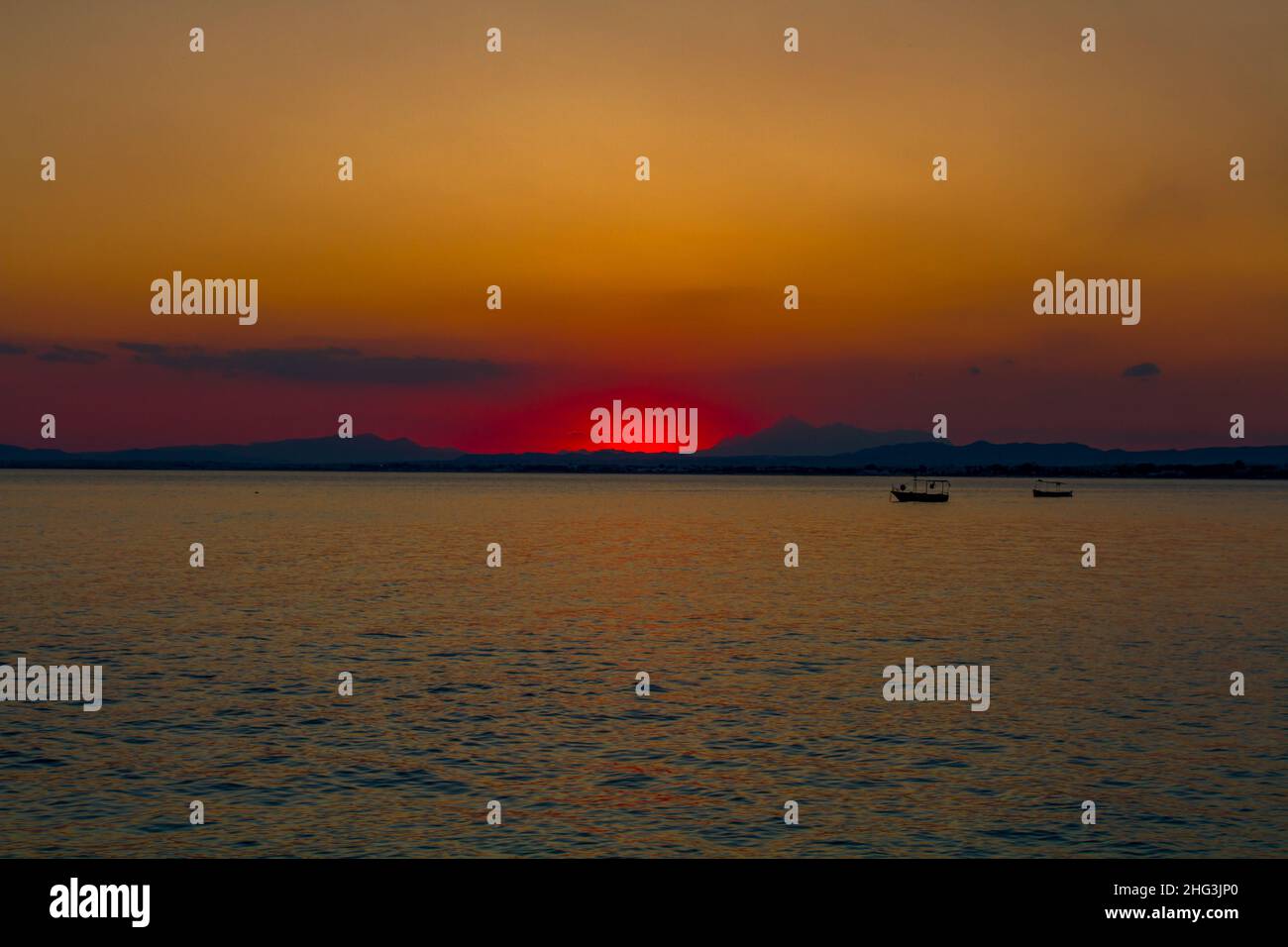 beautiful sunset over the water Stock Photo - Alamy