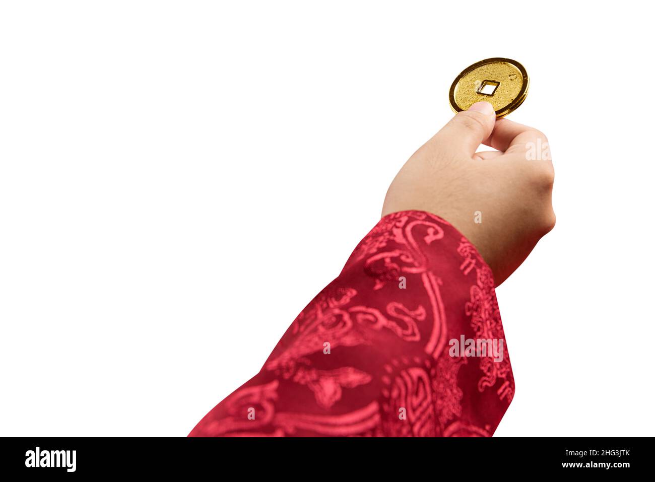 Hand holding golden Chinese coin isolated over white background Stock ...