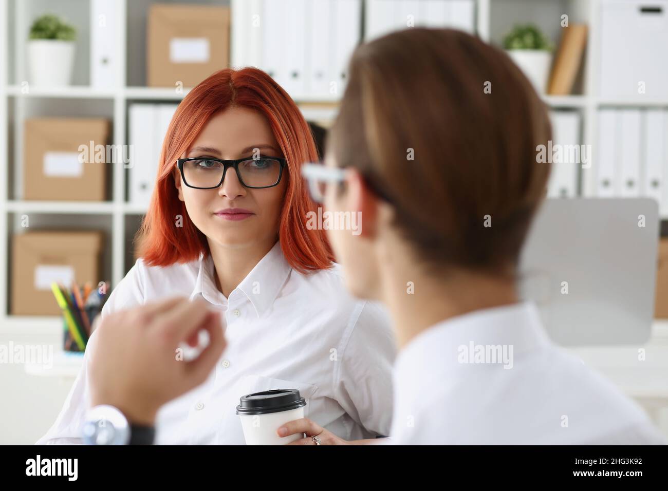 Group of people sit in office deliberate on problem Stock Photo - Alamy