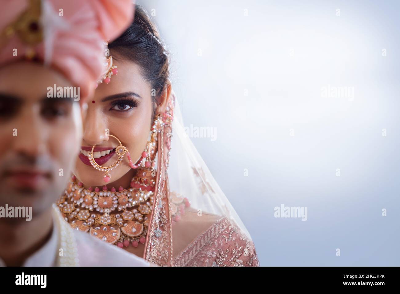 Close-up of wedding couple in a traditional wedding dress Stock Photo ...