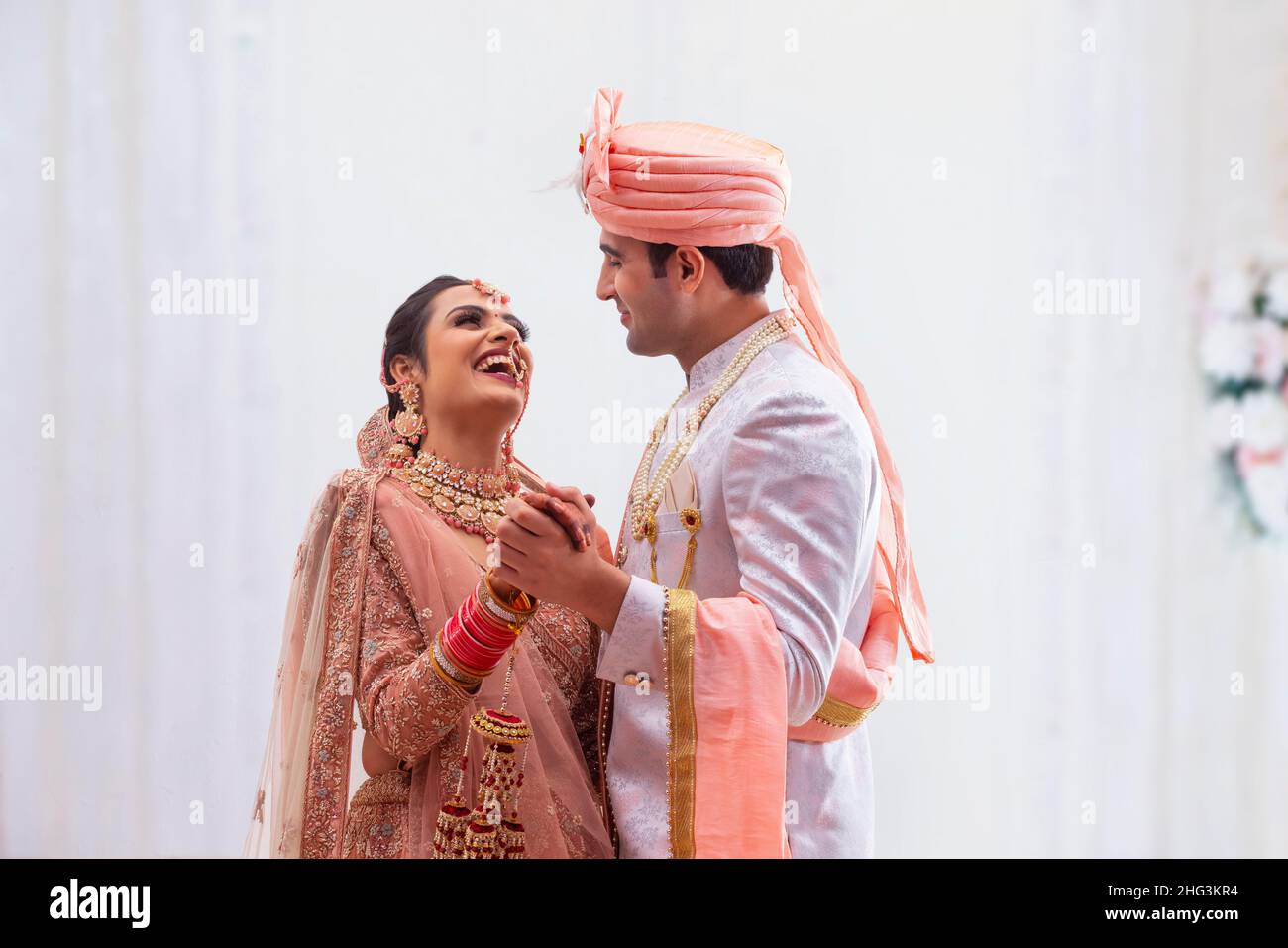 Portrait of wedding couple in a traditional wedding dress Stock Photo ...