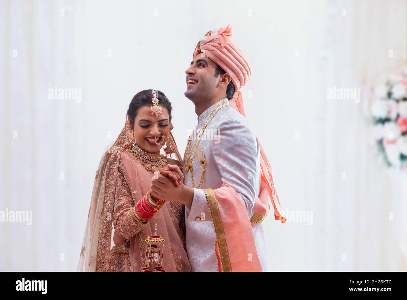 Portrait of wedding couple in a traditional wedding dress Stock Photo ...