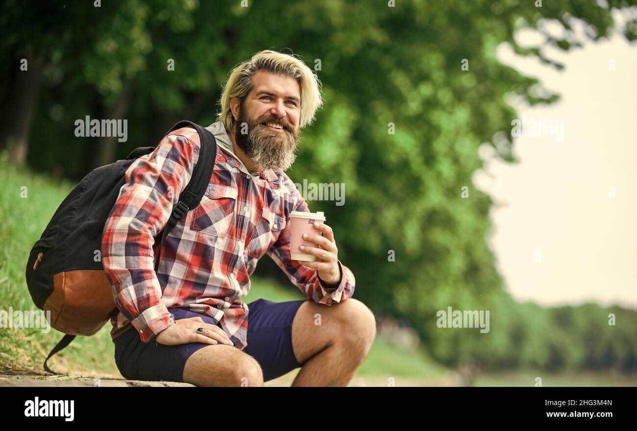 Drinking hot coffee. Drink tea or coffee. Man with cup outdoors ...