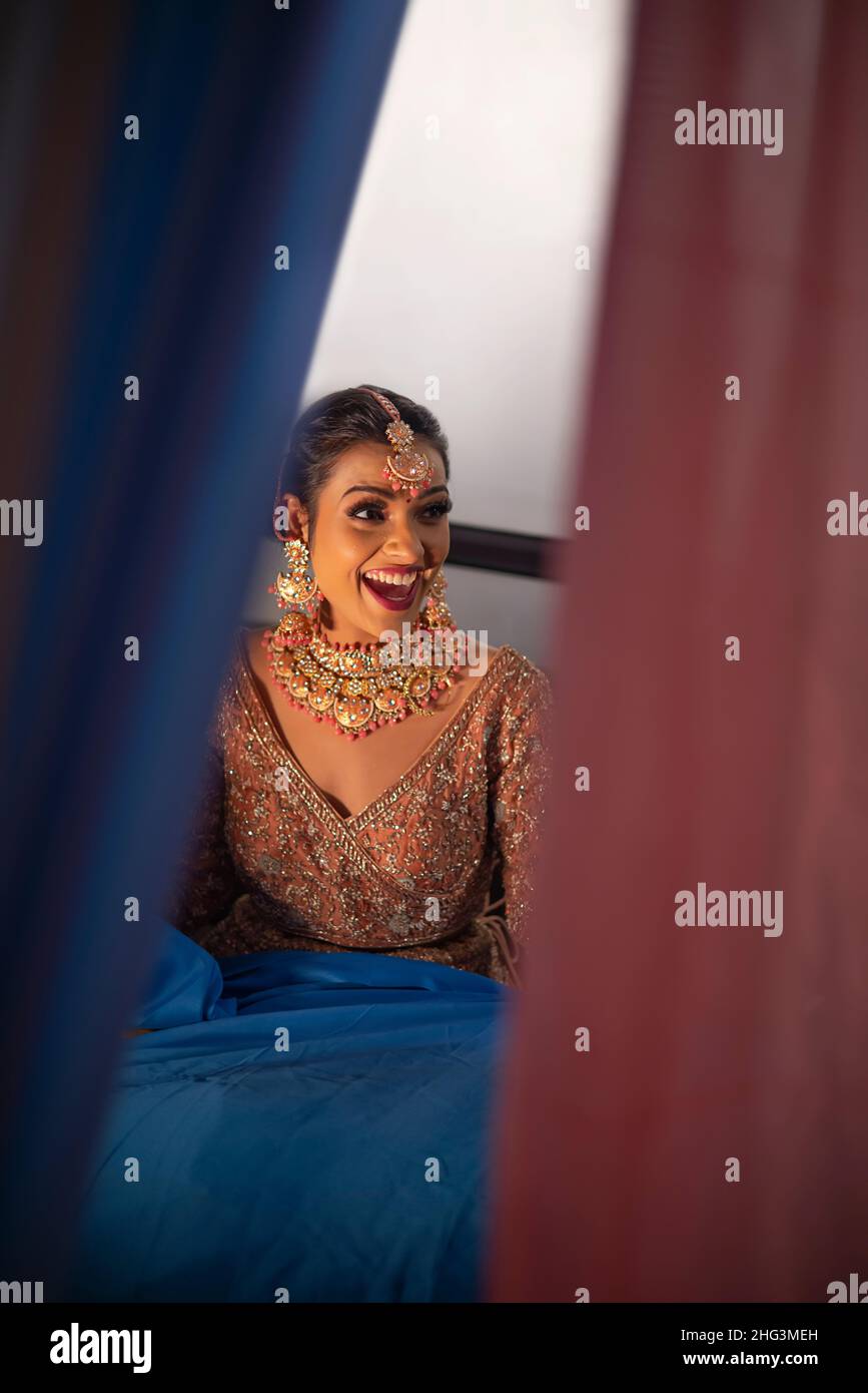 Portrait of a beautiful bride in traditional wedding outfit Stock Photo ...
