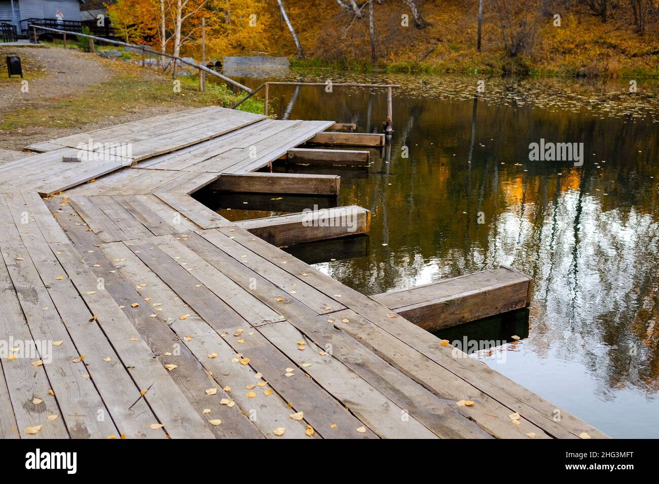 Wide boardwalk for boats. Part of the lake is visible. No people ...