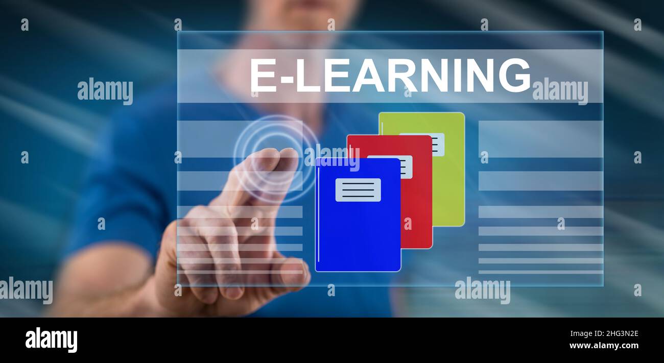 Man touching an e-learning concept on a touch screen with his finger ...