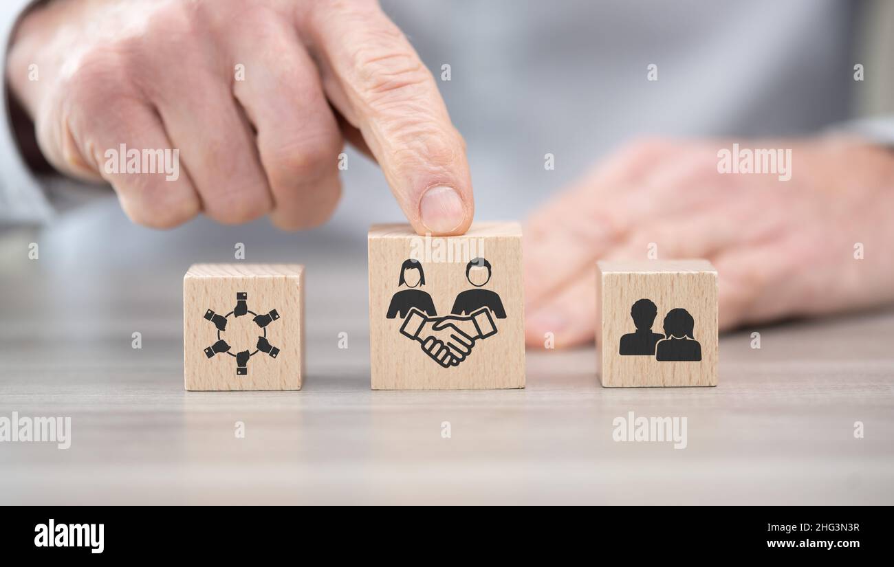Wooden blocks with symbol of friendship concept Stock Photo - Alamy