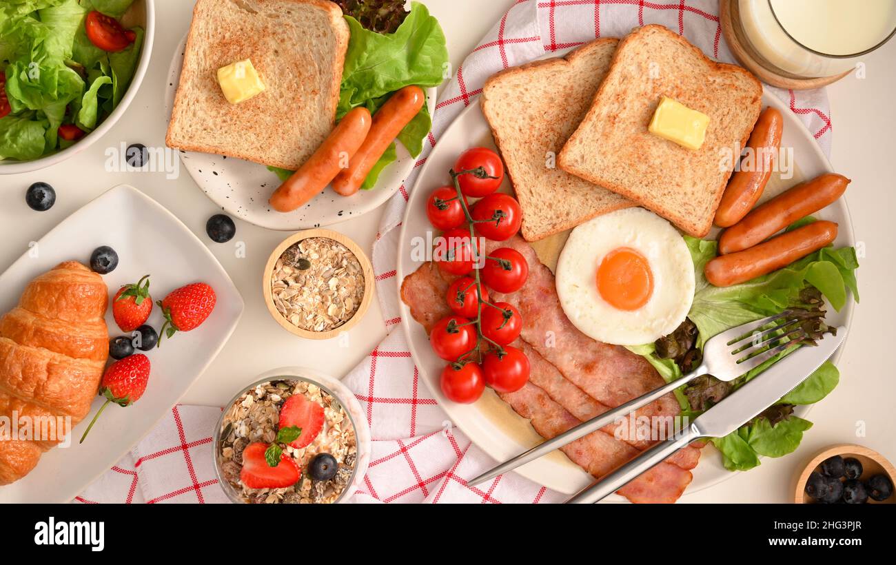 Yummy English breakfast set with healthy ingredient. Egg, toasts, hams ...