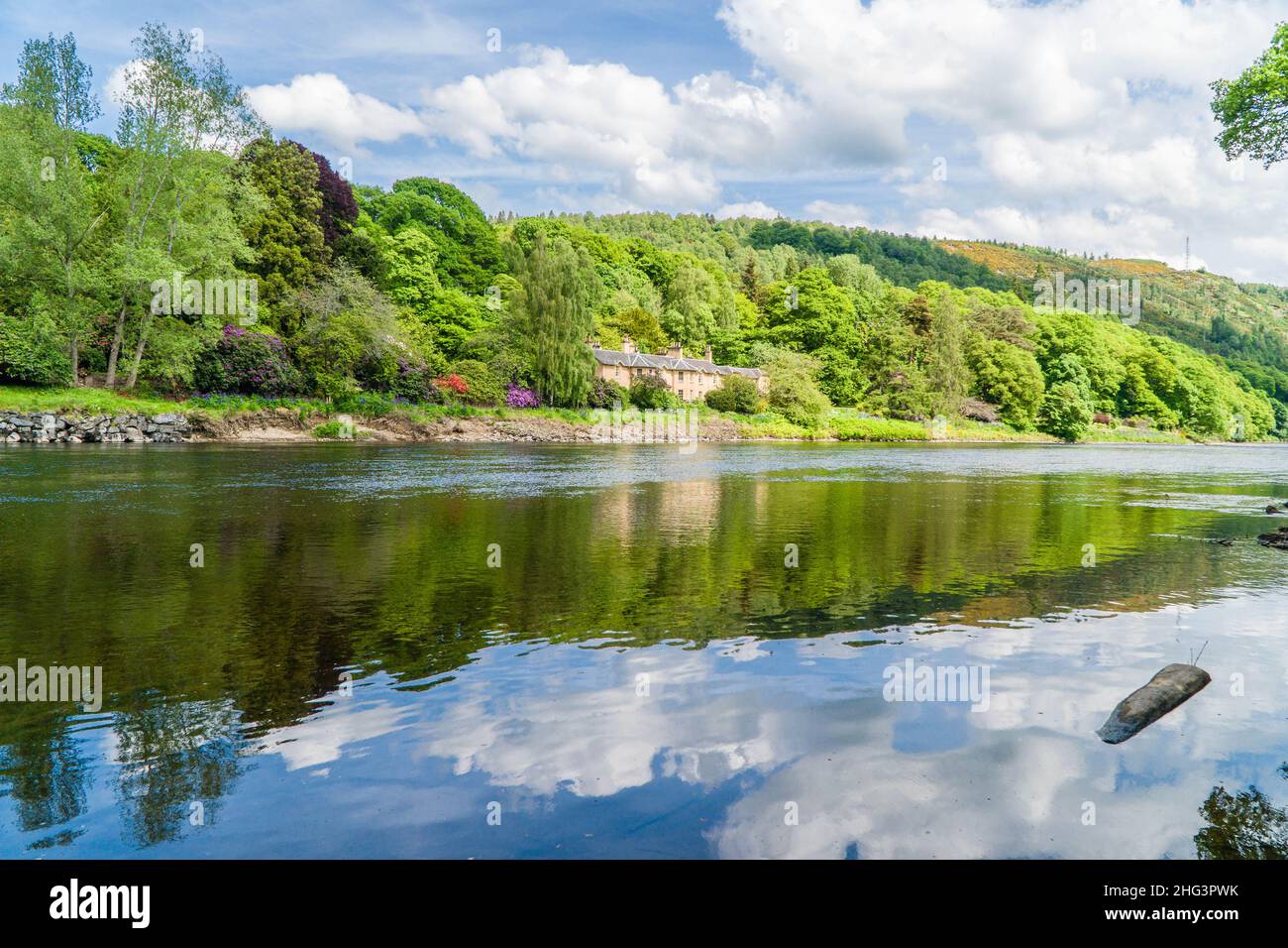 The river Tay flowing east on a clear sunny day through Birnam ...