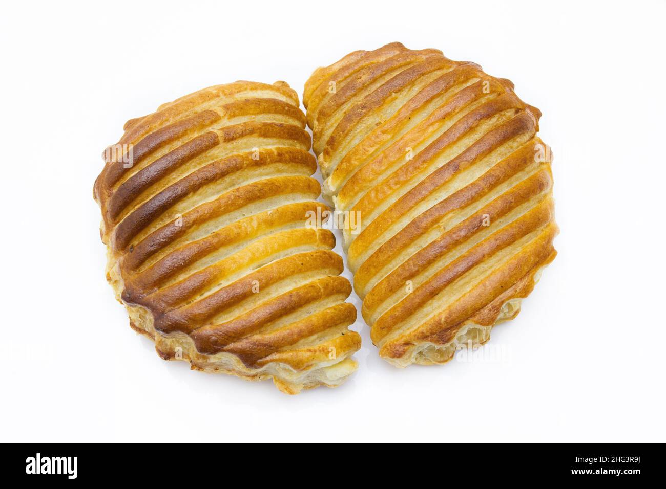 two apple turnovers on a white background Stock Photo - Alamy