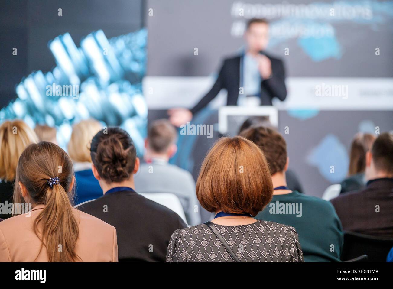 Audience watching presentation during business seminar Stock Photo - Alamy