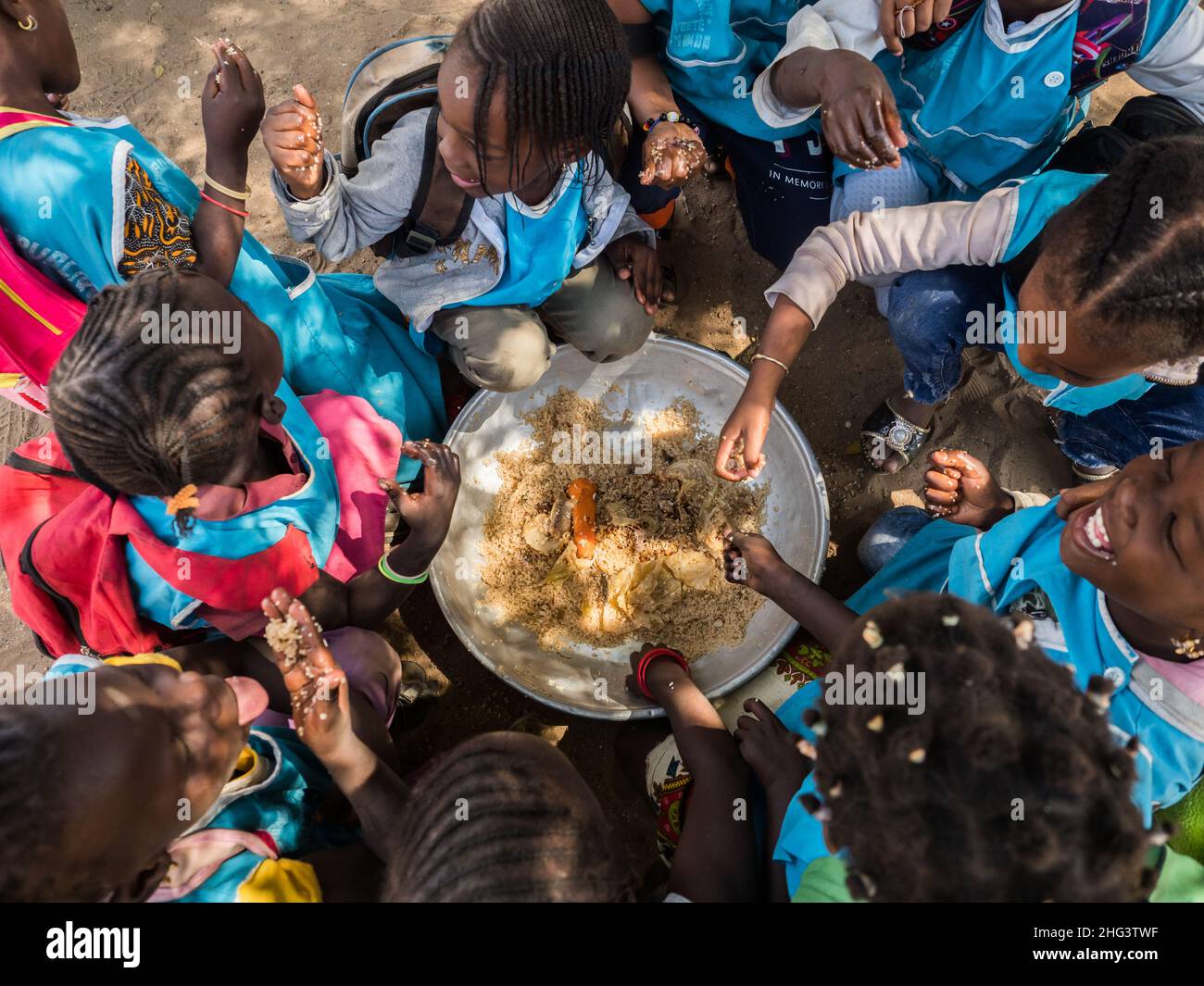 Senegal, Africa - Jan 2019: Senegalese children eat at school together ...